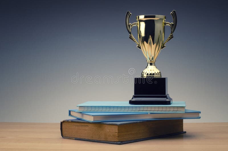 Golden Trophy on Stack of Book for Education Success Concept Stock ...