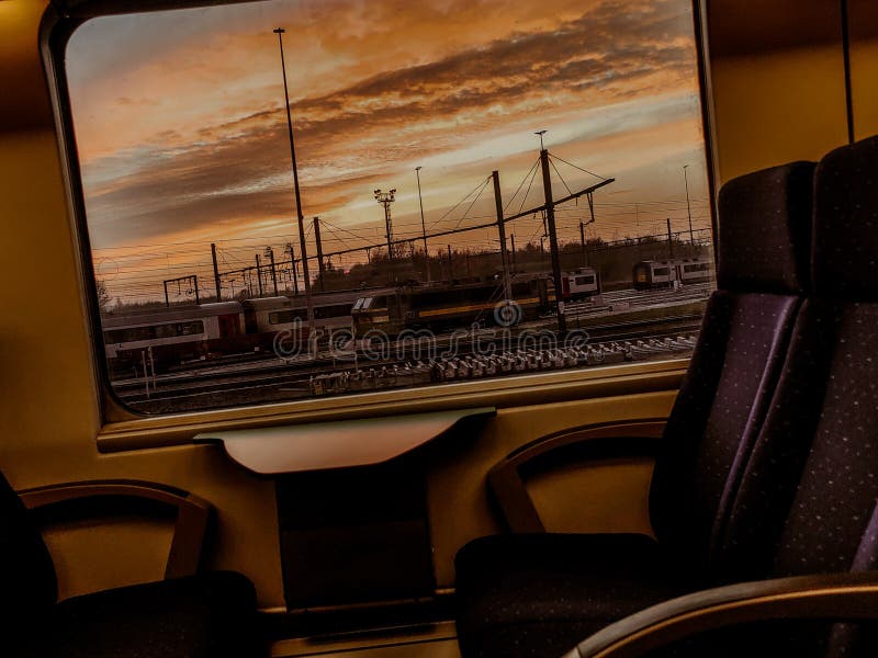 Golden view inside a train stock image. Image of lighting - 215452419