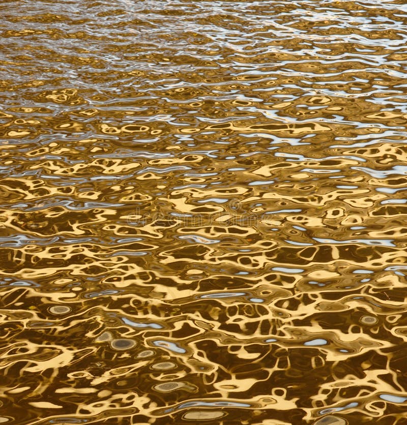 Golden water stock photo. Image of purity, liquid, metal - 25039002