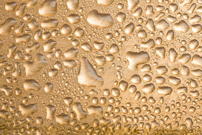 Golden Water Drops Over Metal Background Picture. Image: 6830603