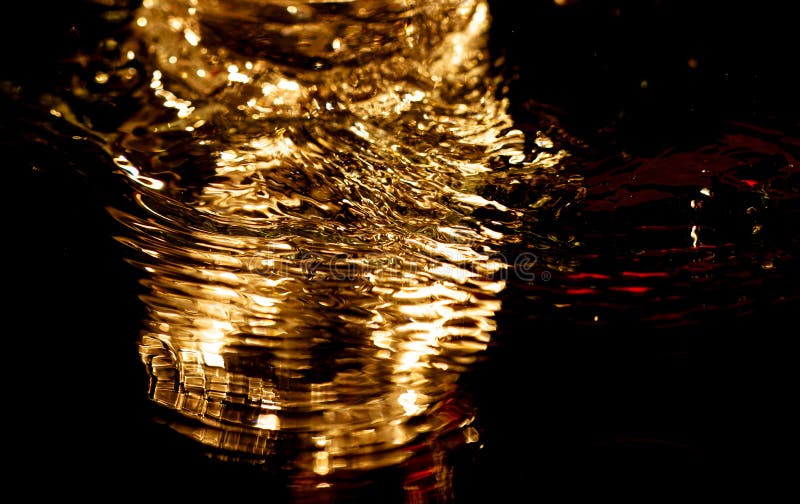 Golden Water with Splashes As an Abstract Background Stock Image ...
