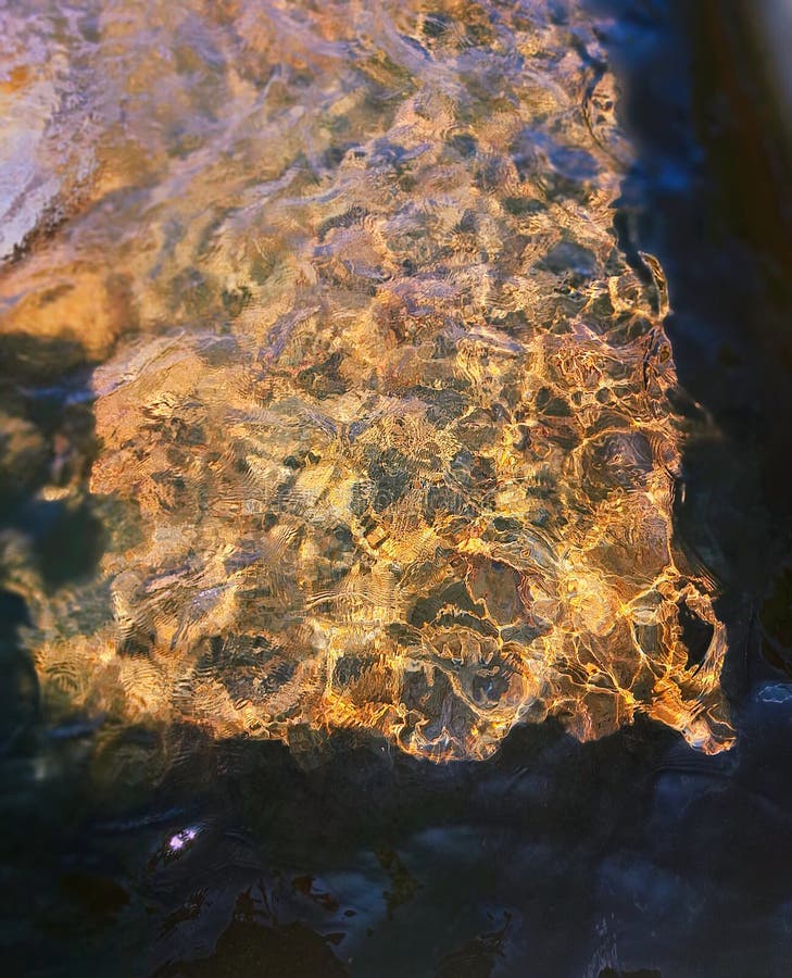 Golden water stock photo. Image of reflection, sunlight - 284278022