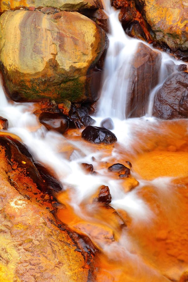 Golden waterfall stock image. Image of rock, splash, pour - 26181157