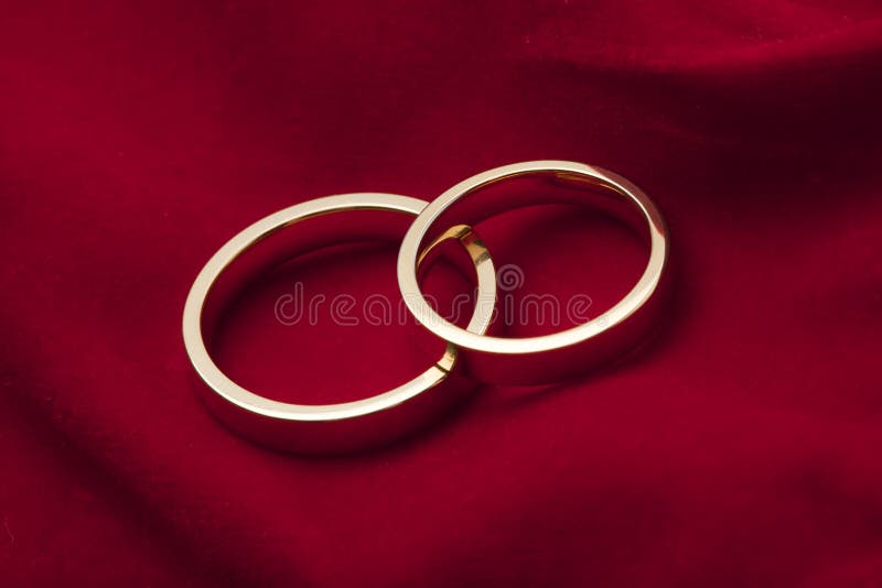 Golden Wedding Rings on Red Velvet Stock Photo - Image of ring, jewelry ...