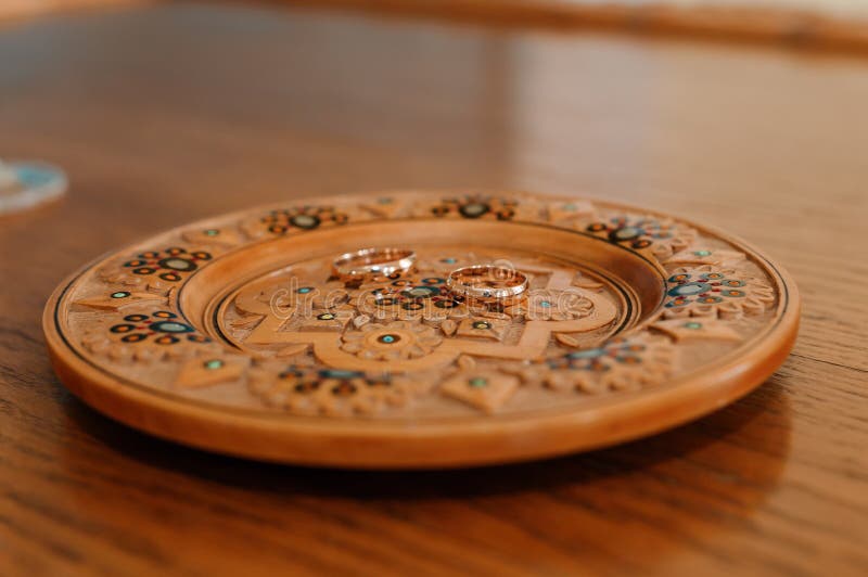 Golden Wedding Rings on a Stand on the Table. Wedding Ceremony Stock ...