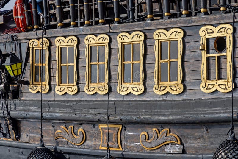 Golden Windows Pirate Ship stock photo. Image of 2023 - 394208404