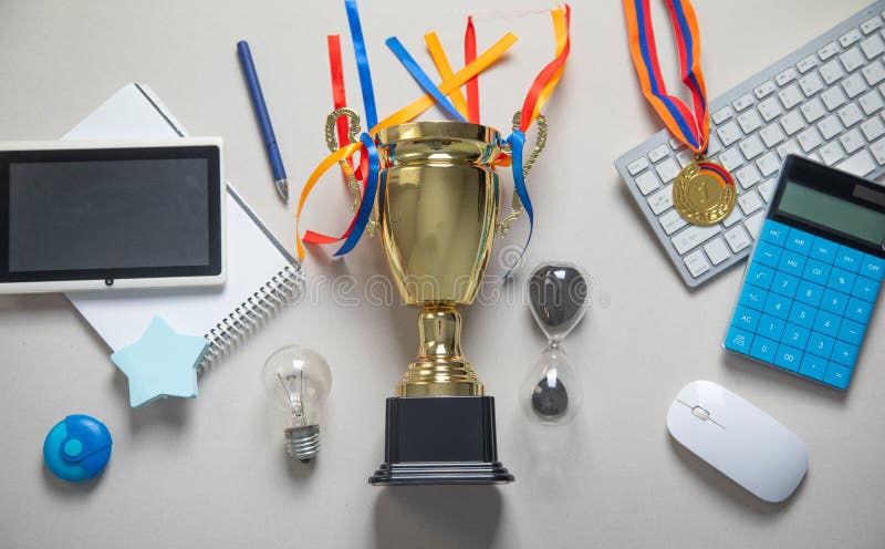 Golden Winner Trophy Cup with a Business Objects Stock Image - Image of ...