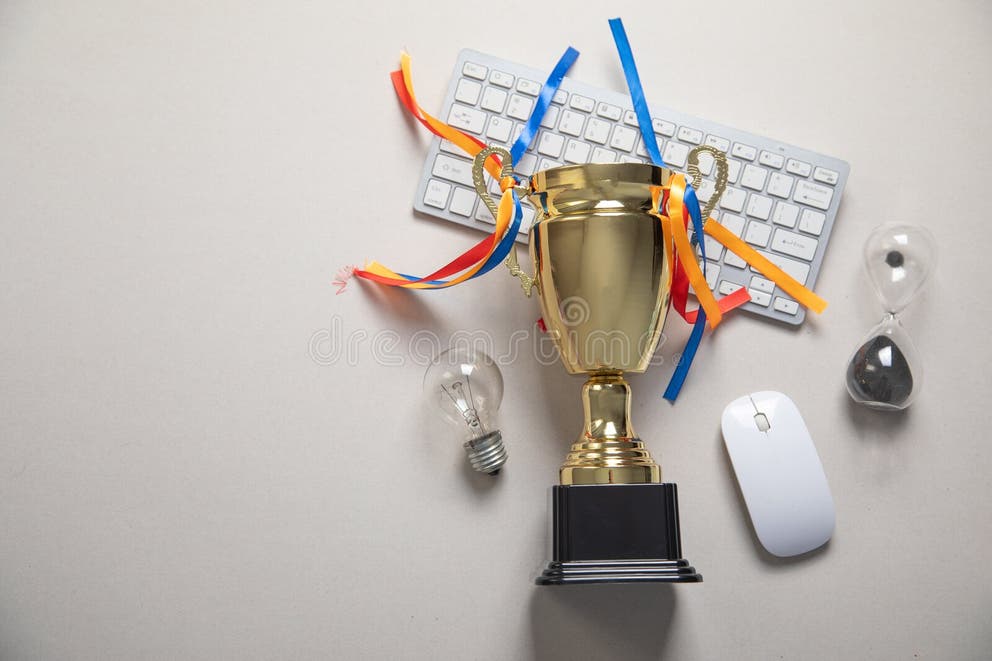 Golden Winner Trophy Cup with a Business Objects Stock Photo - Image of ...