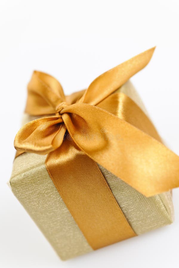 Two Golden Wrapped Gift Boxes Stock Photo - Image of pattern, bows ...