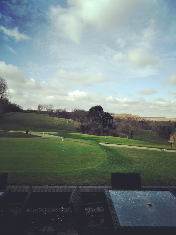 Golf stock photo. Image of golf, table, patio, bushes - 147309728