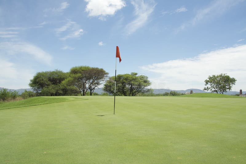 Golf in Africa stock image. Image of hole, flag, terrain - 13029091