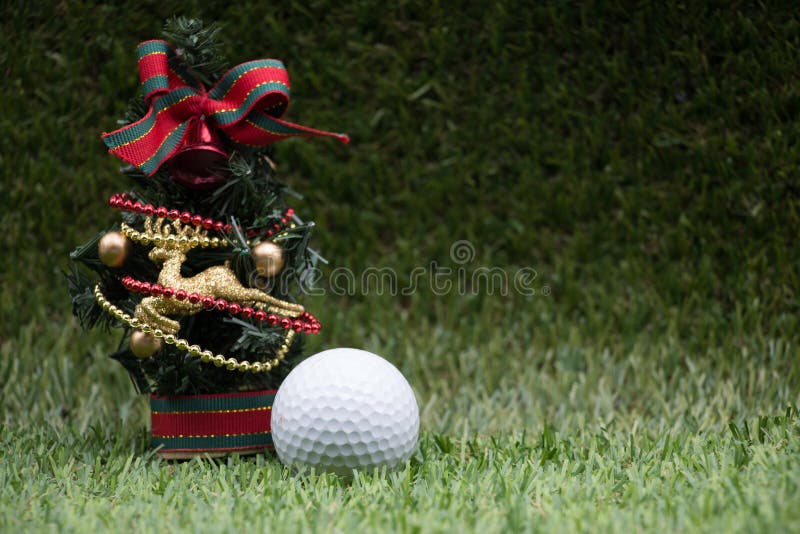 Golf Ball with Christmas Tree are on Green Grass Stock Photo - Image of ...