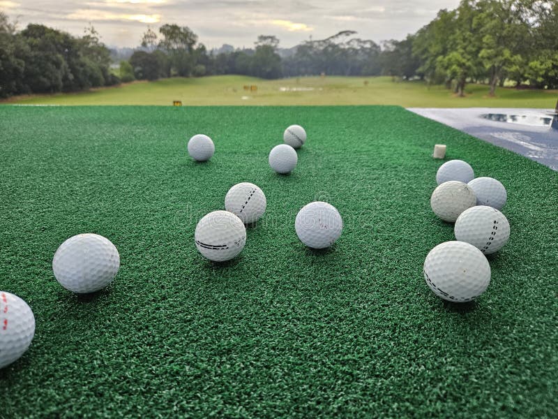 Golf ball on driving range stock image. Image of golfer - 397431221