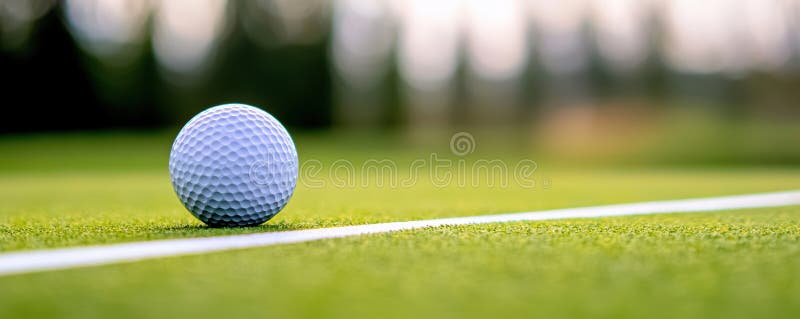 Golf Ball on the Edge of the Green, Just Crossing the White Line ...
