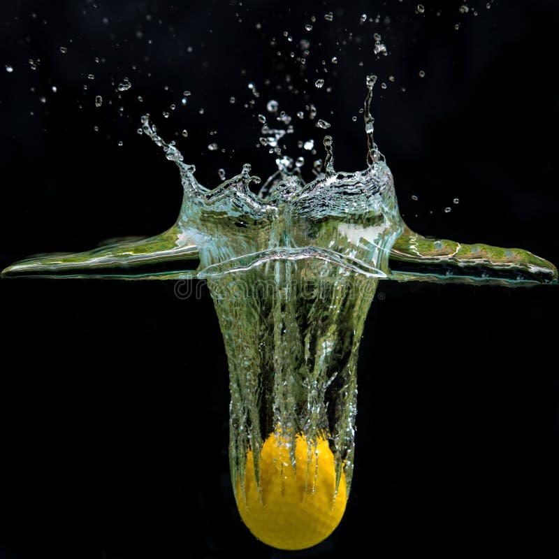 Golf ball fall water stock image. Image of yellow, nature - 96564555
