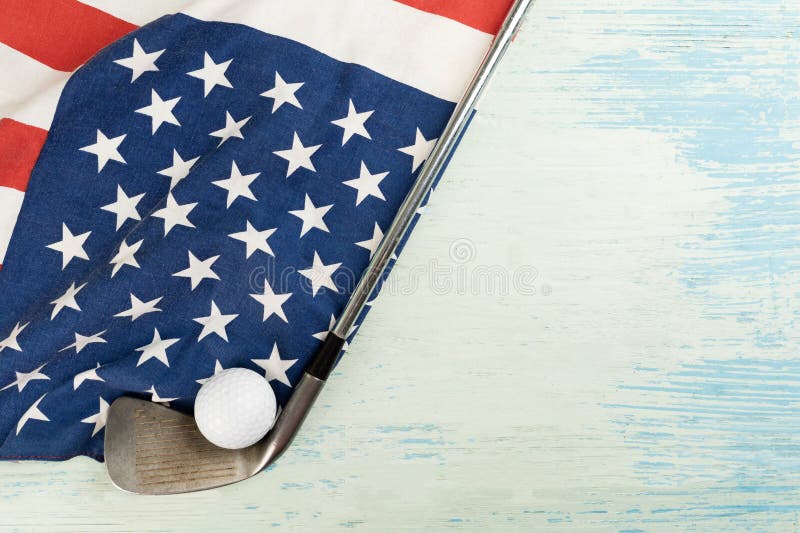 Golf Ball with Flag of USA on Wood Blue Table Background Stock Photo ...