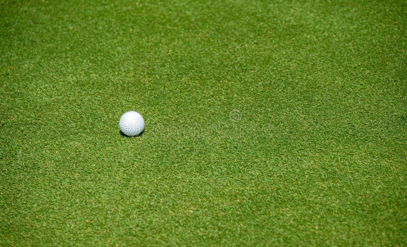 A Golf Ball on the Green in Golf Course. Stock Photo - Image of area ...