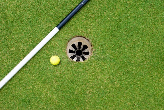 Golf Ball at Hole stock photo. Image of leisure, checker - 6358346