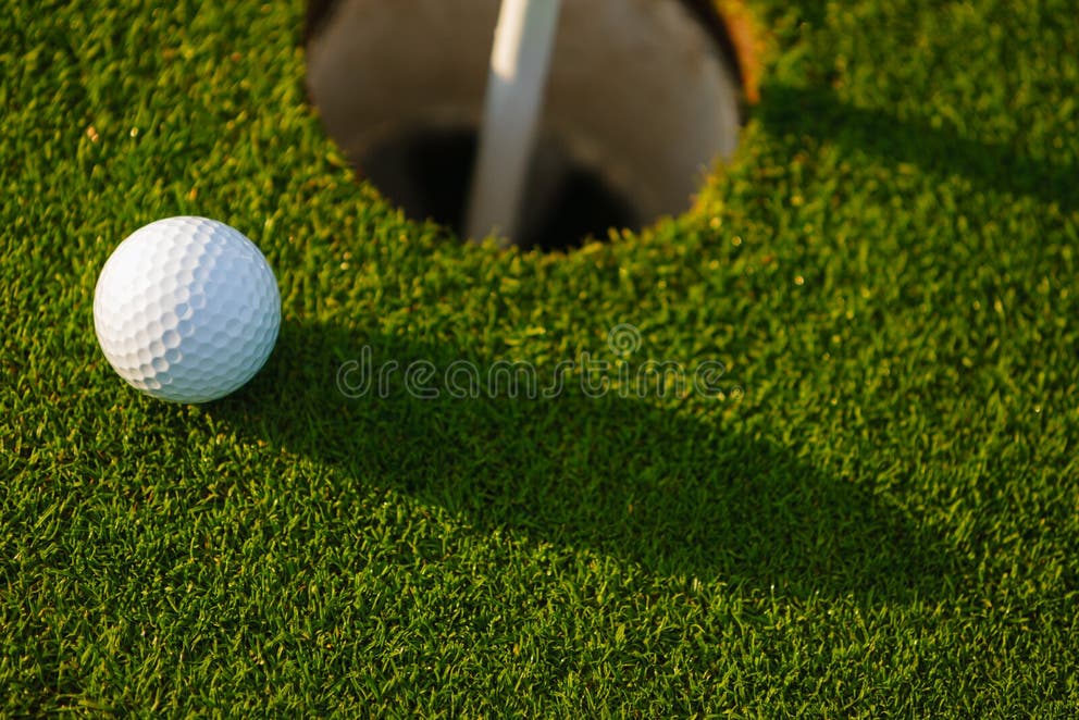 Golf Ball Inches from the Cup Stock Photo - Image of leisure, golfer ...