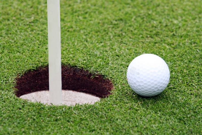 Golf Ball near Pin stock image. Image of flag, shallow - 2237201