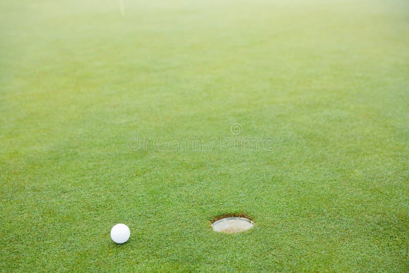Golf ball next to hole stock image. Image of sport, golf - 50484681