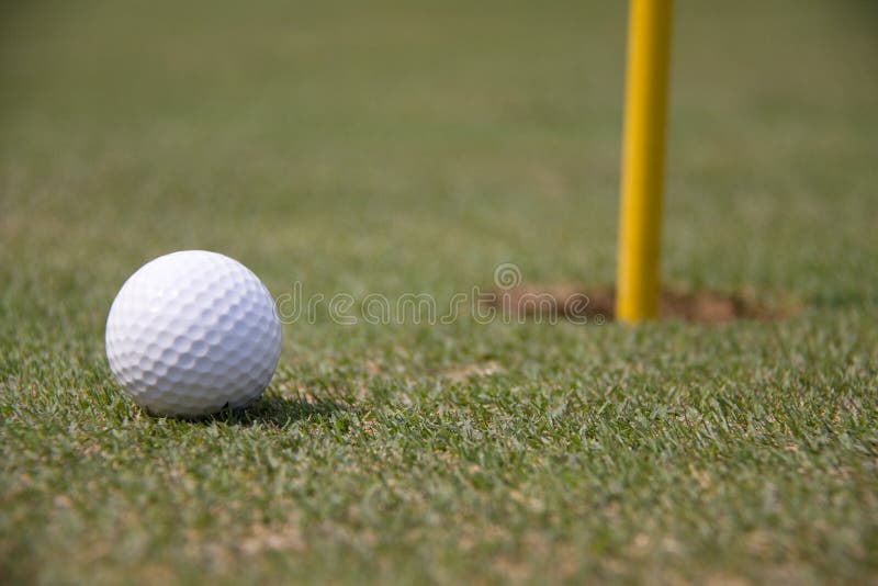 Golf Ball and Pin stock image. Image of holes, lines - 13679265