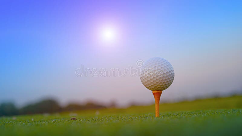 Golf Ball on Tee in a Beautiful Golf Course with Morning Sunshine Stock ...