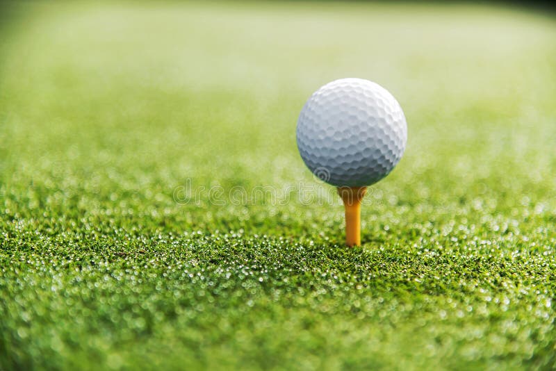 Golf Ball on Tee on Green Grass Stock Image - Image of ball, green ...