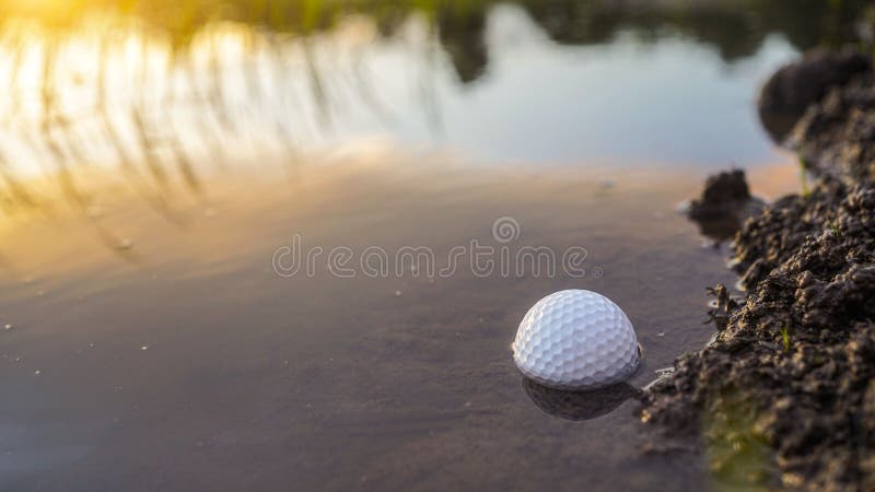 Golf Ball in Water Hazard. Problems and Obstacles of Golf Balls are in ...