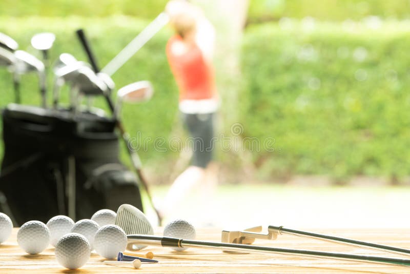Golf Balls, Golf Equipment, and Golf Club on the Table on Driving Range ...