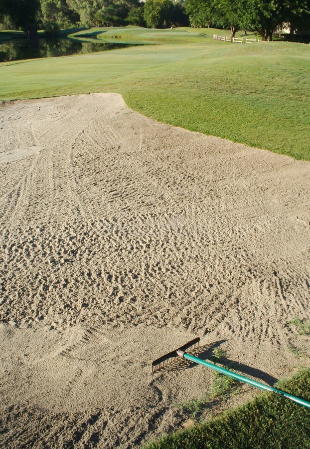 Golf Bunker and Rake stock image. Image of sport, grass - 2762317