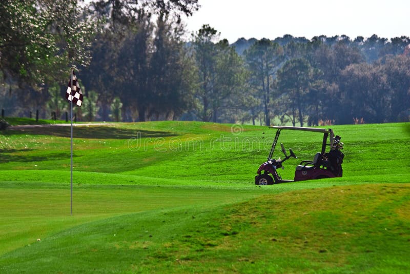 Golf cart on golf course stock image. Image of hilly, parked - 3813537