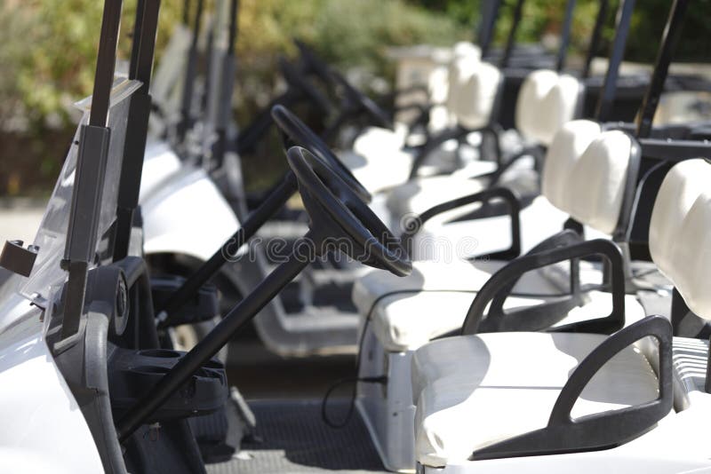 Row of Golf Carts from Front View Stock Photo - Image of golf, outdoors ...