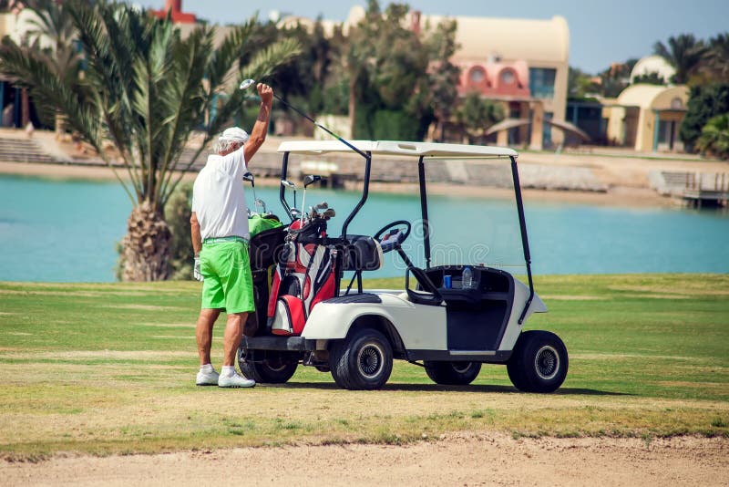 Golf Carts on the Grass Sport Field. Lifestyle and Sport Concept Stock ...