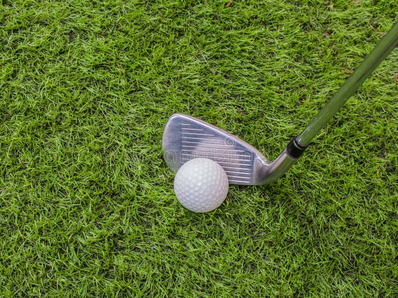 Golf Club and Ball on the Artificial Turf Stock Photo - Image of club ...