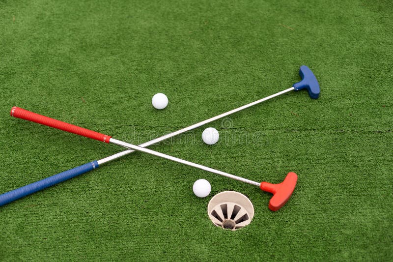 Golf club, ball and hole stock photo. Image of putt - 275514858