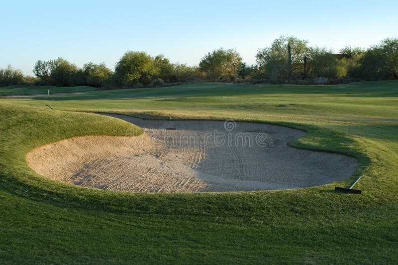 Sand trap on golf course stock image. Image of green - 25250559