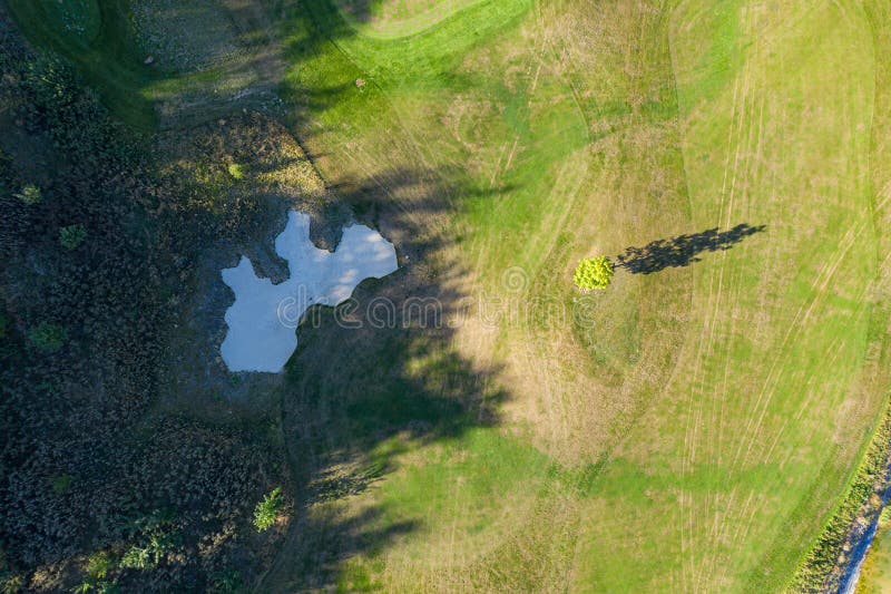 A golf course from above stock photo. Image of tree - 196698134