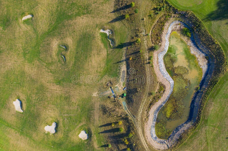 A golf course from above stock image. Image of exclusive - 196698193
