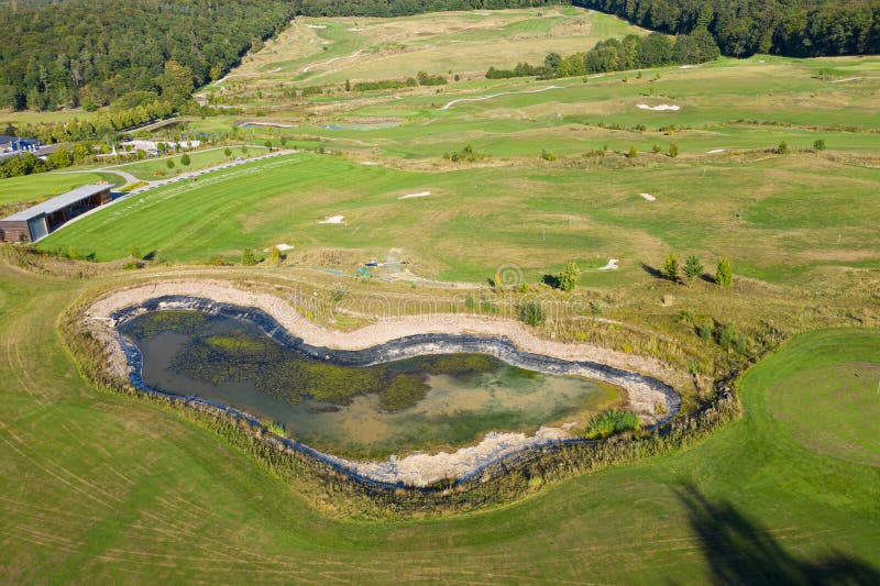 A golf course from above stock image. Image of golf - 196697959
