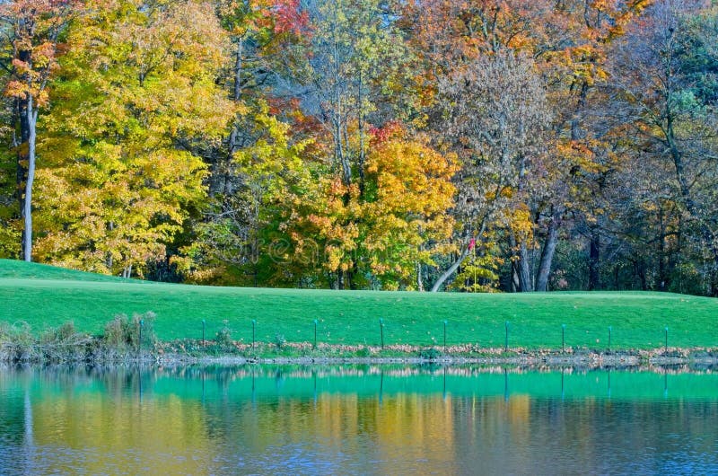 Golf Course in the Autumn with Fall Colors in the Background Stock ...