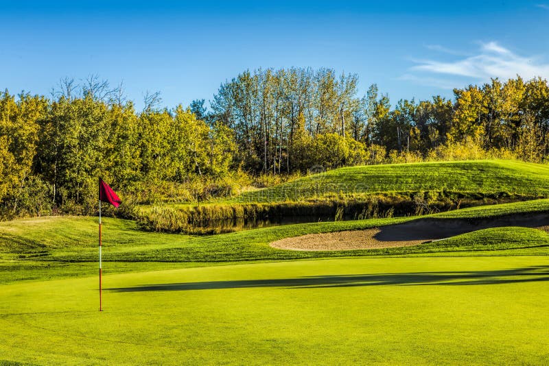 Golf Course in Autumn stock image. Image of flag, landscape - 33934531