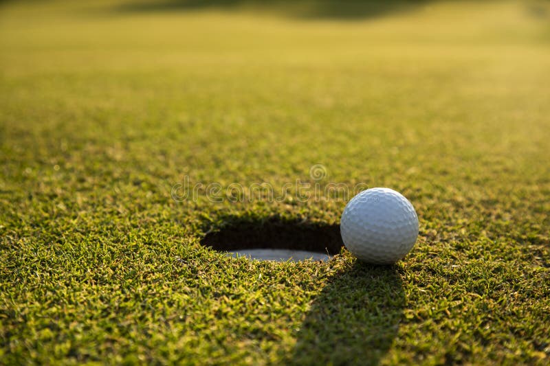 Golf Course with Ball and Grass Stock Image - Image of field, game ...