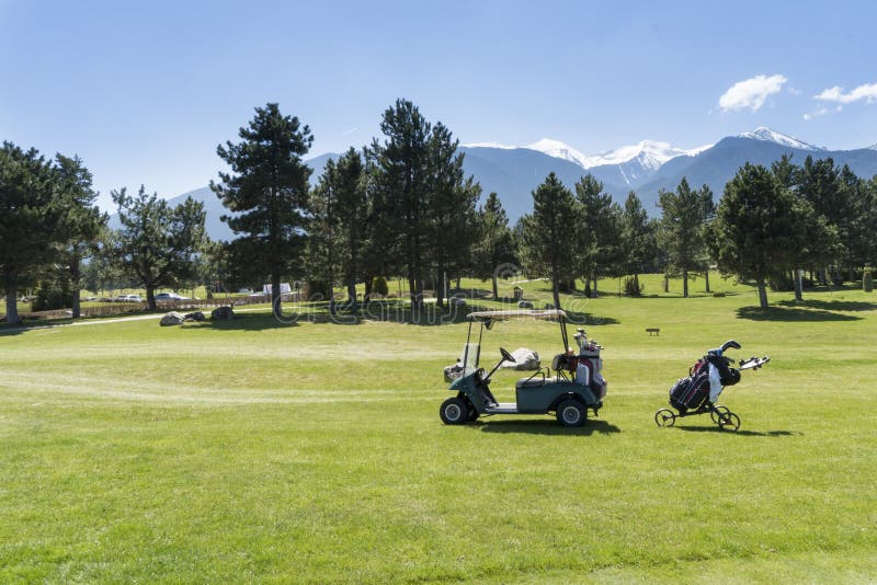 Golf course with golf-cart stock photo. Image of cart - 107685442