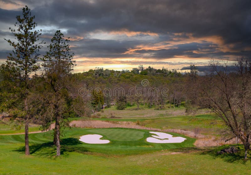 A Golf Course with Grass, Trees and Two White Holes Stock Photo - Image ...