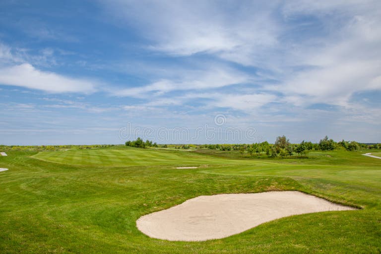 Golf Course. Green Grass Field and Cloudy Blue Sky Stock Image - Image ...