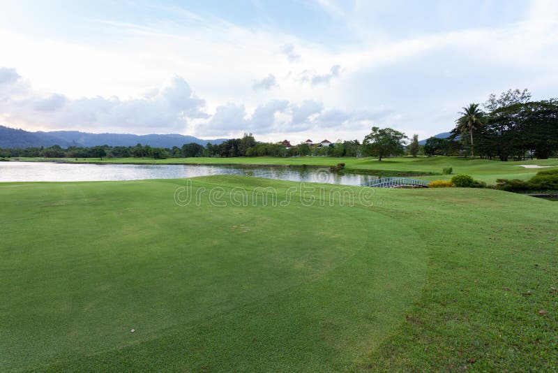 Golf Course Green Grass Field and Lagoon. Stock Photo - Image of golf ...