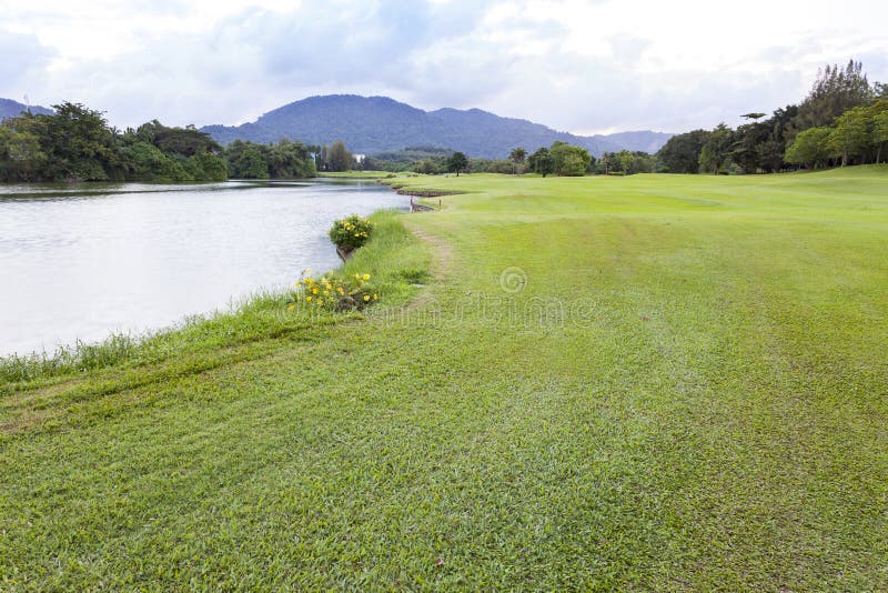 Golf Course Green Grass Field and Lagoon. Stock Image - Image of ...