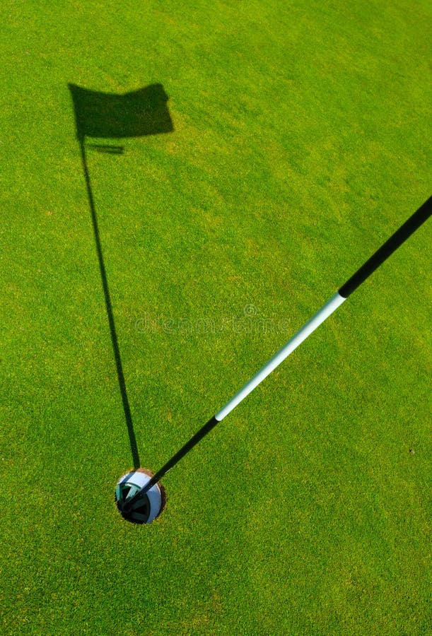 Golf Course Hole with Flagstick Shadow Stock Image - Image of flag ...
