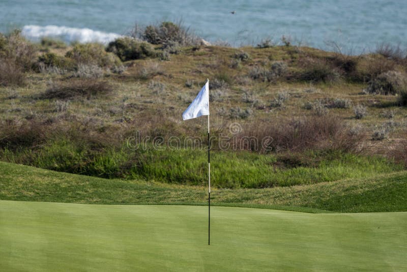 A Golf Course and Its Flag Pole. Flag Pole on a Golf Green Stock Image ...